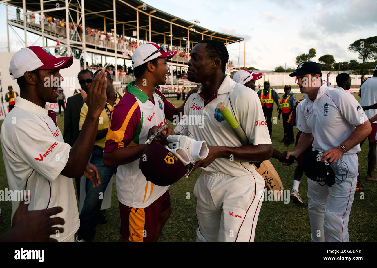 West Indies's Daren Powell shakes hands with teammates after drawing ...