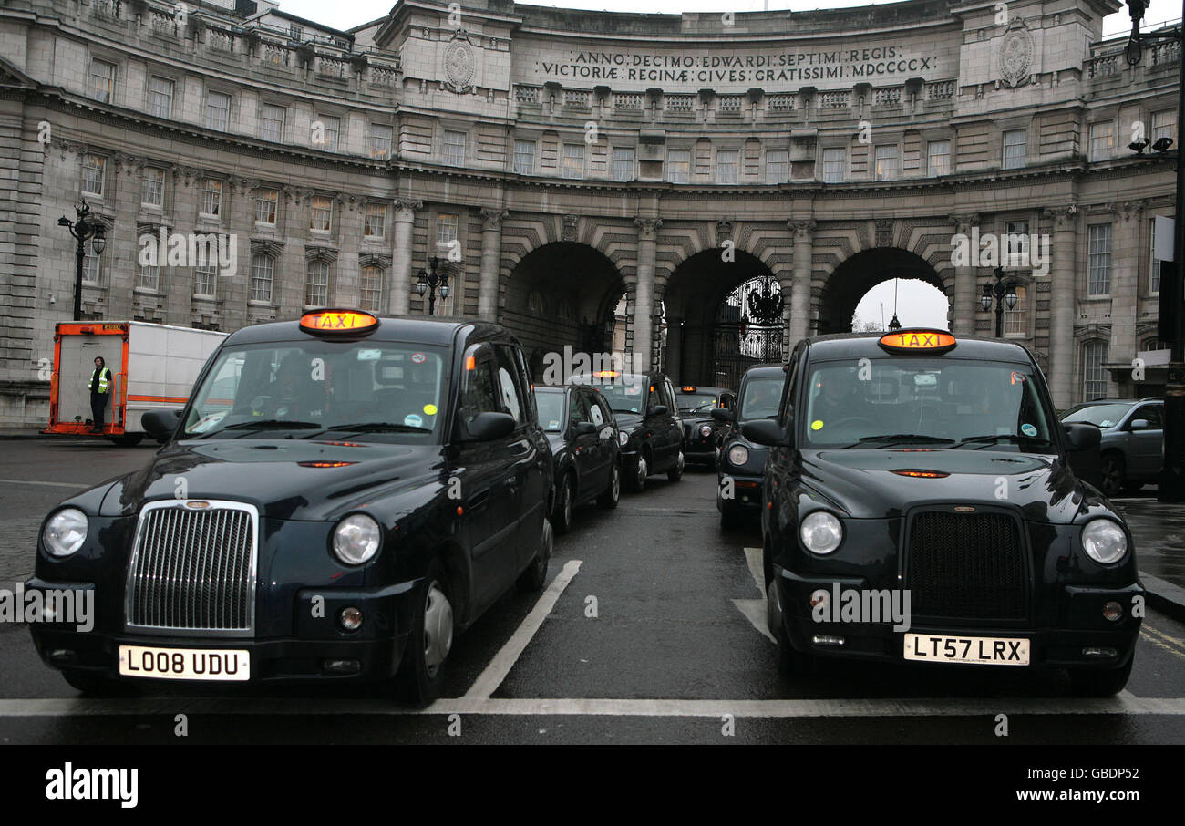 Taxis line up in Trafalgar Square, London, protesting against a new ...