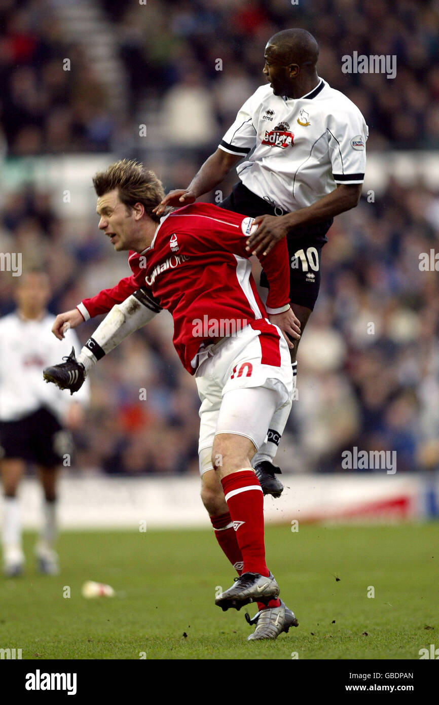 Derby countys michael johnson jumps challenge nottingham forests taylor ...