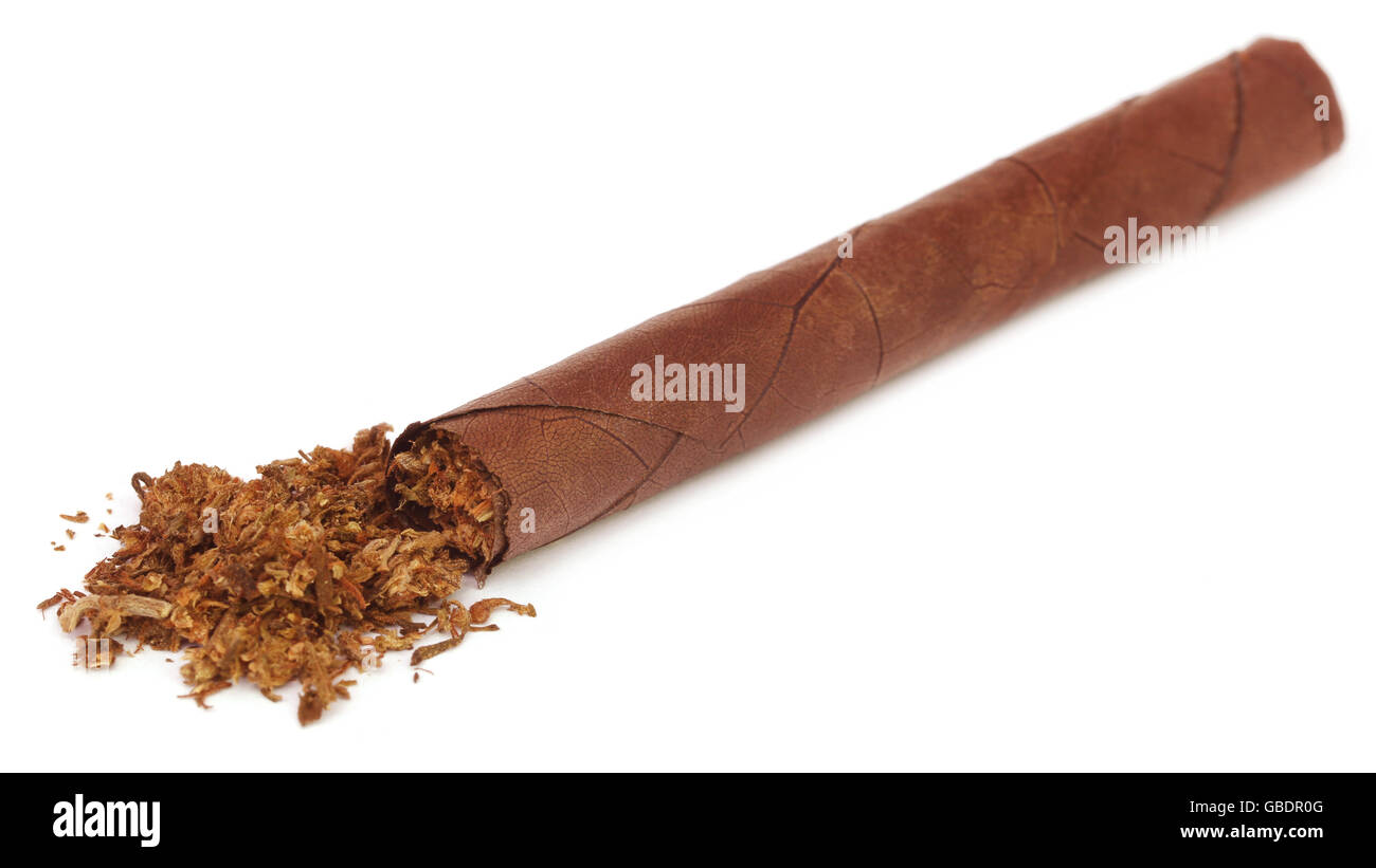 Marijuana as cigar over white background Stock Photo - Alamy