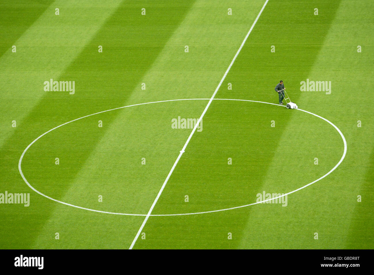 The pitch markings are given the finishing touches hi-res stock ...