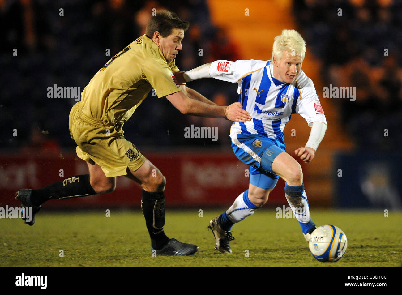 Colchester uniteds david perkins and tranmere rovers gareth edds hi-res ...