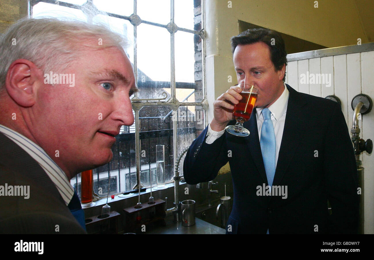 Conservative Party Leader David Cameron samples some beer with managing ...