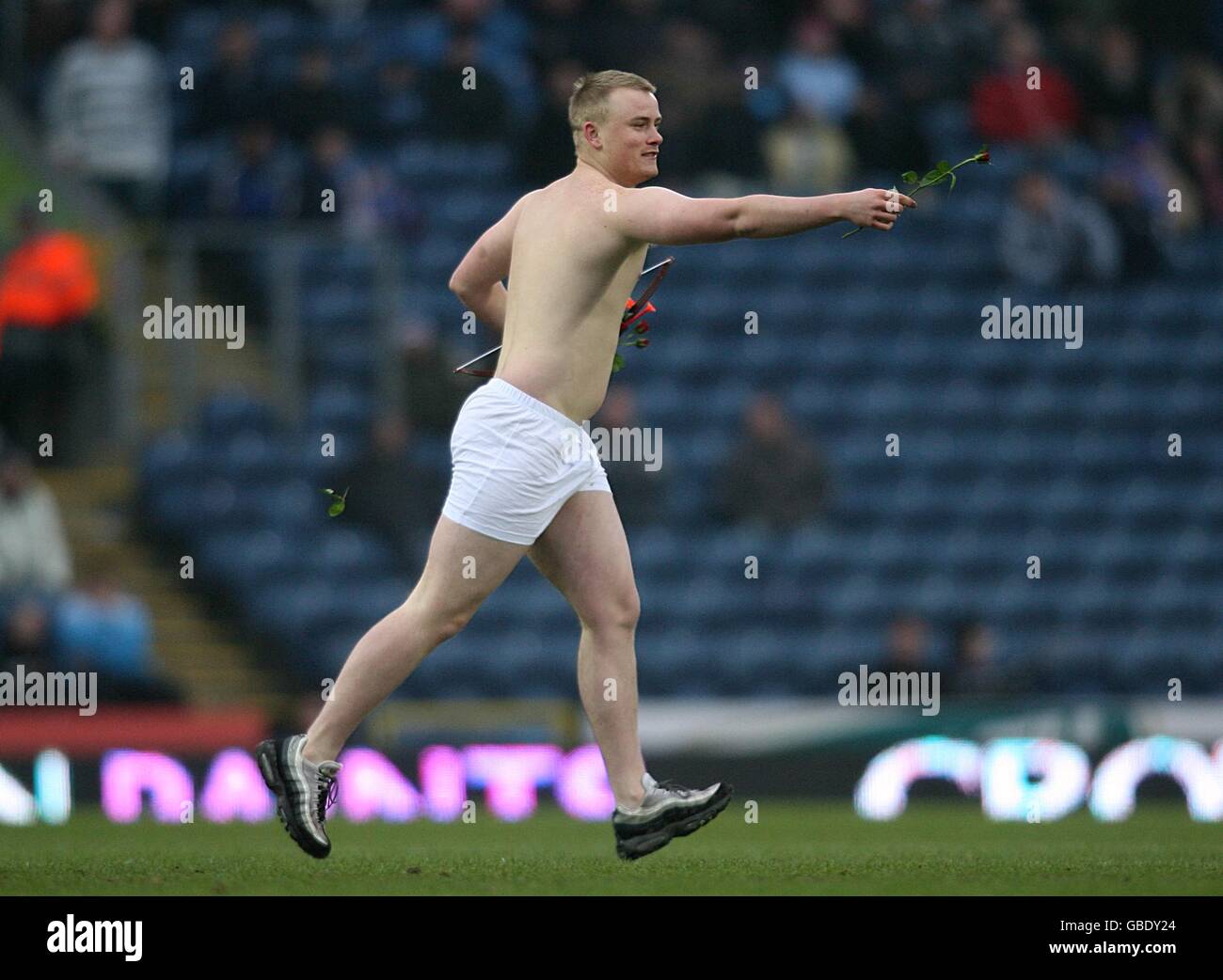 Streaker on football pitch hi-res stock photography and images - Alamy