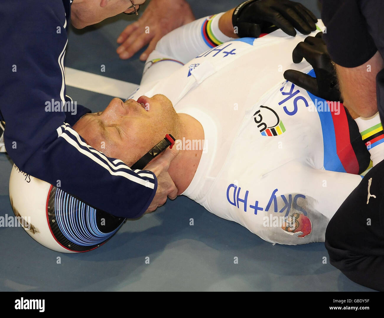 Sir Chris Hoy receives attention following his crash with the mark on ...