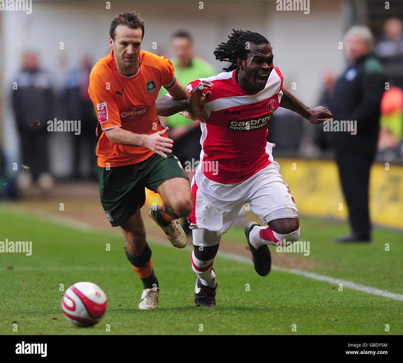 Charlton Athletic's Kelly Youga (right) and Plymouth Argyle's Karl ...