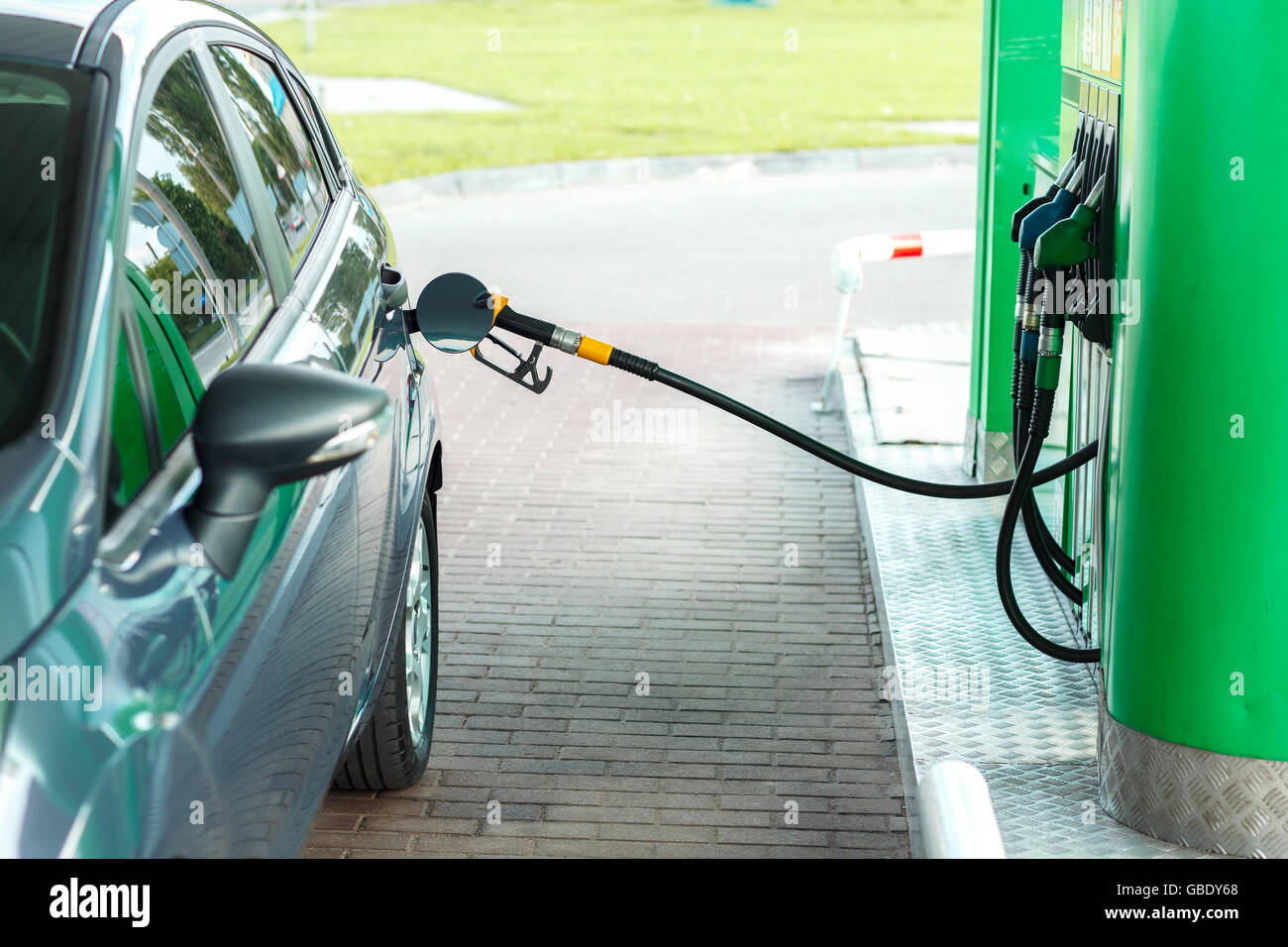 Car refueling on a petrol station closeup Stock Photo - Alamy