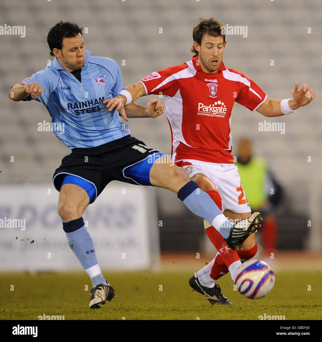 Rotherham United's Drewe Broughton and Scunthorpe United's Sam Togwell ...