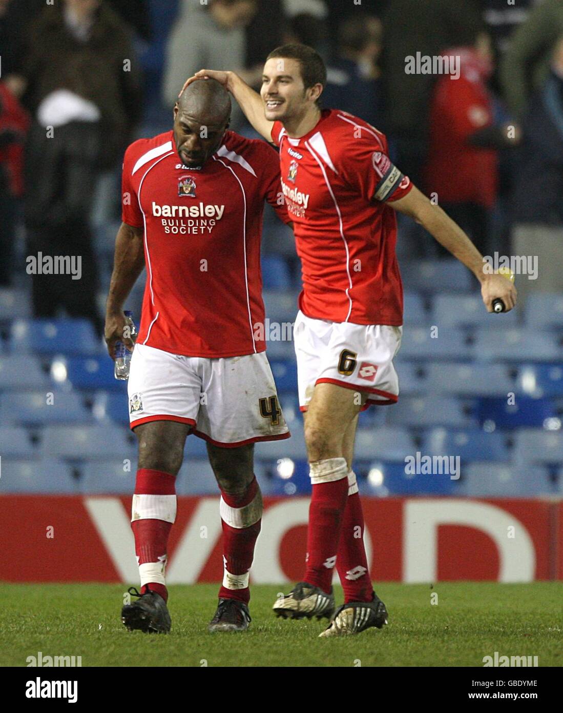 Barnsleys stephen foster right and darren moore celebrate the win hi ...