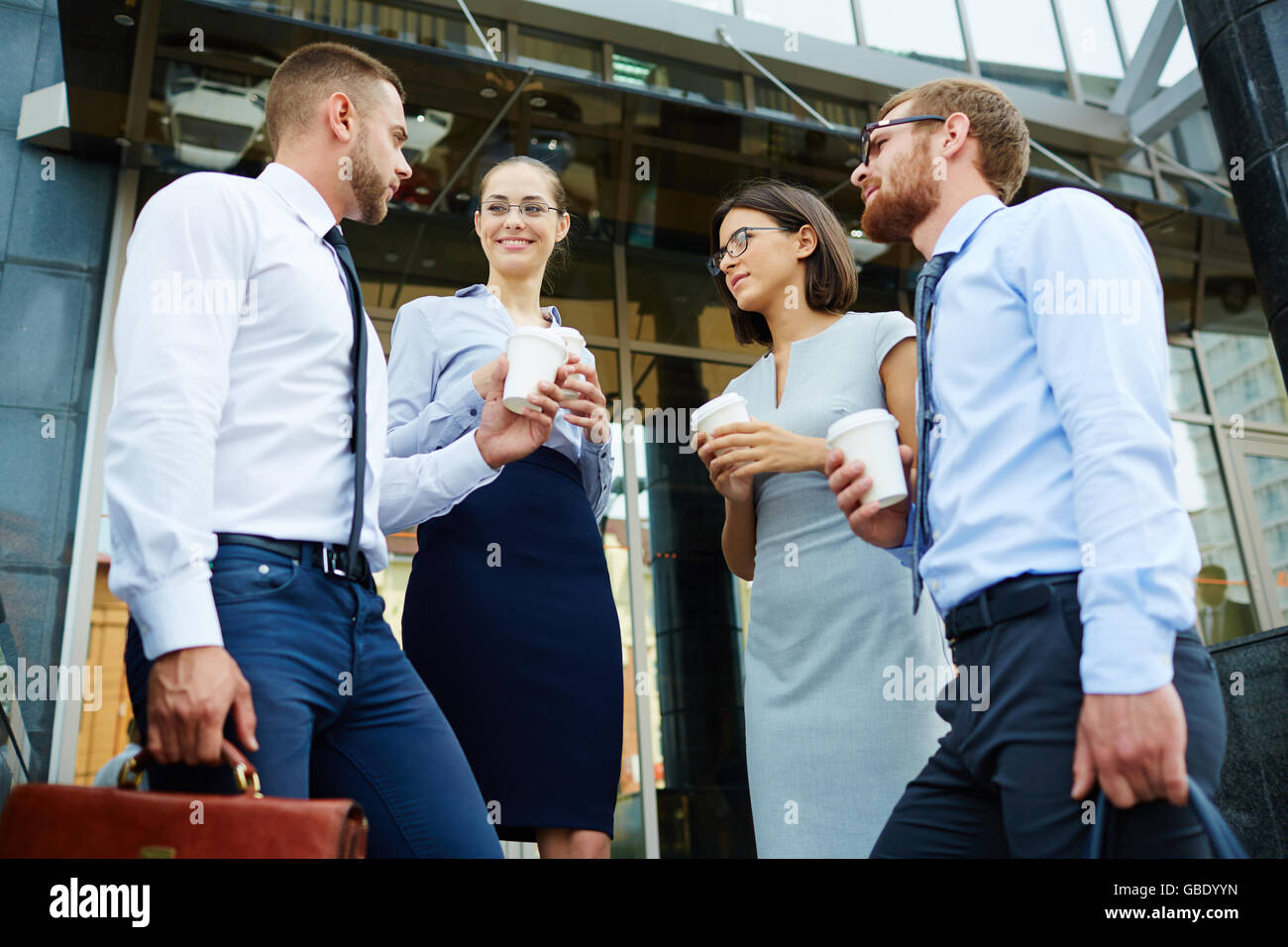 Four colleagues hi-res stock photography and images - Alamy