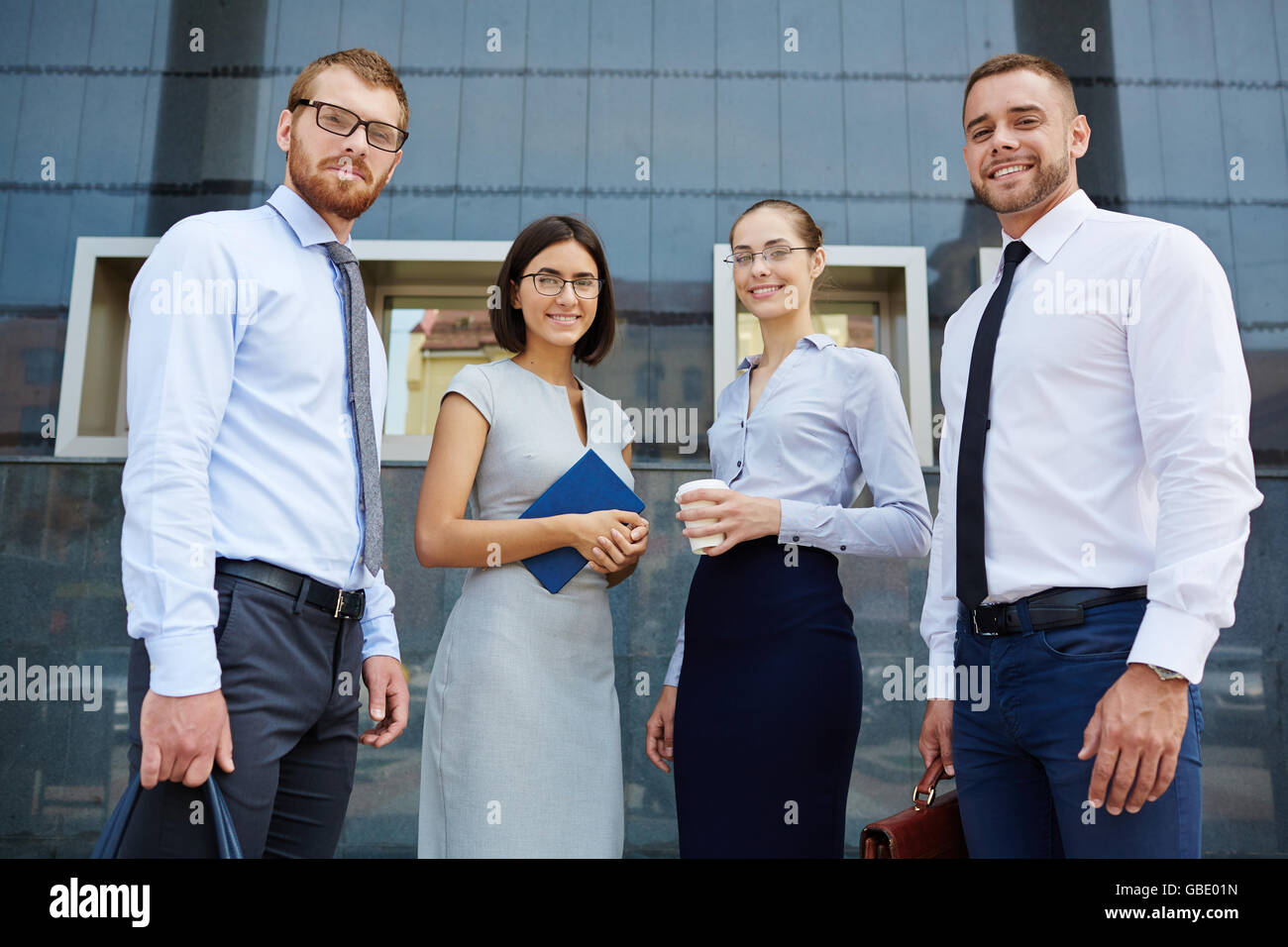 Group successful managers looking hi-res stock photography and images ...