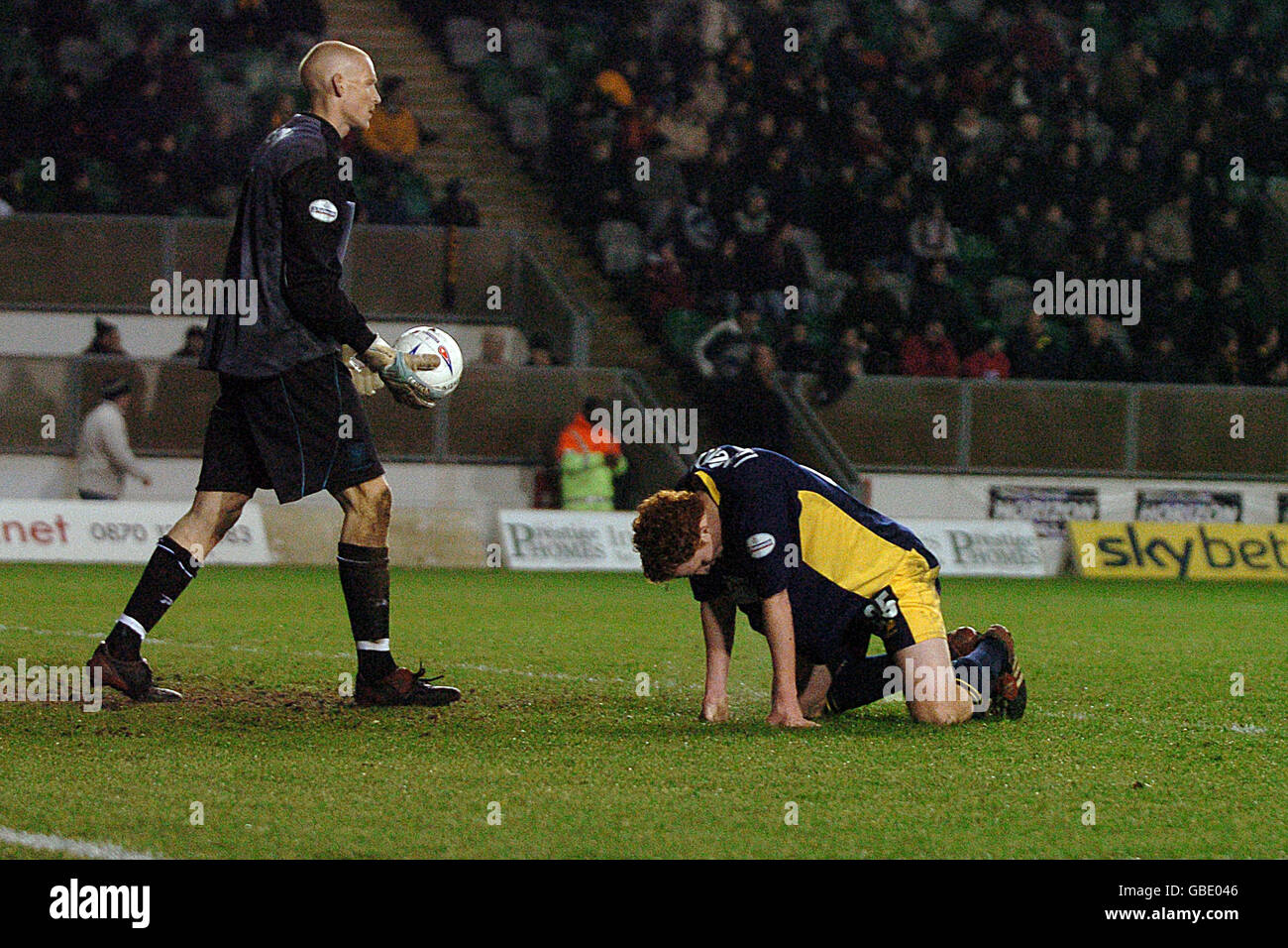 Wimbledon's goalkeeper Scott Bevan and Dean Lewington are dejected ...