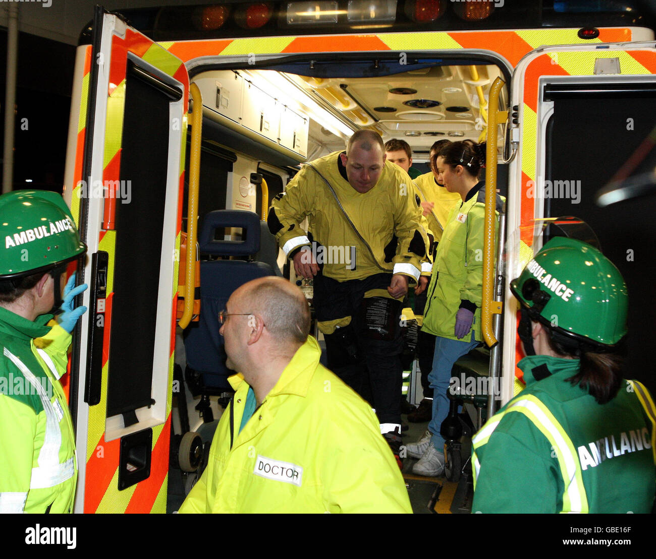 Rescued crew from the ditched helicopter arrive at the accident and ...