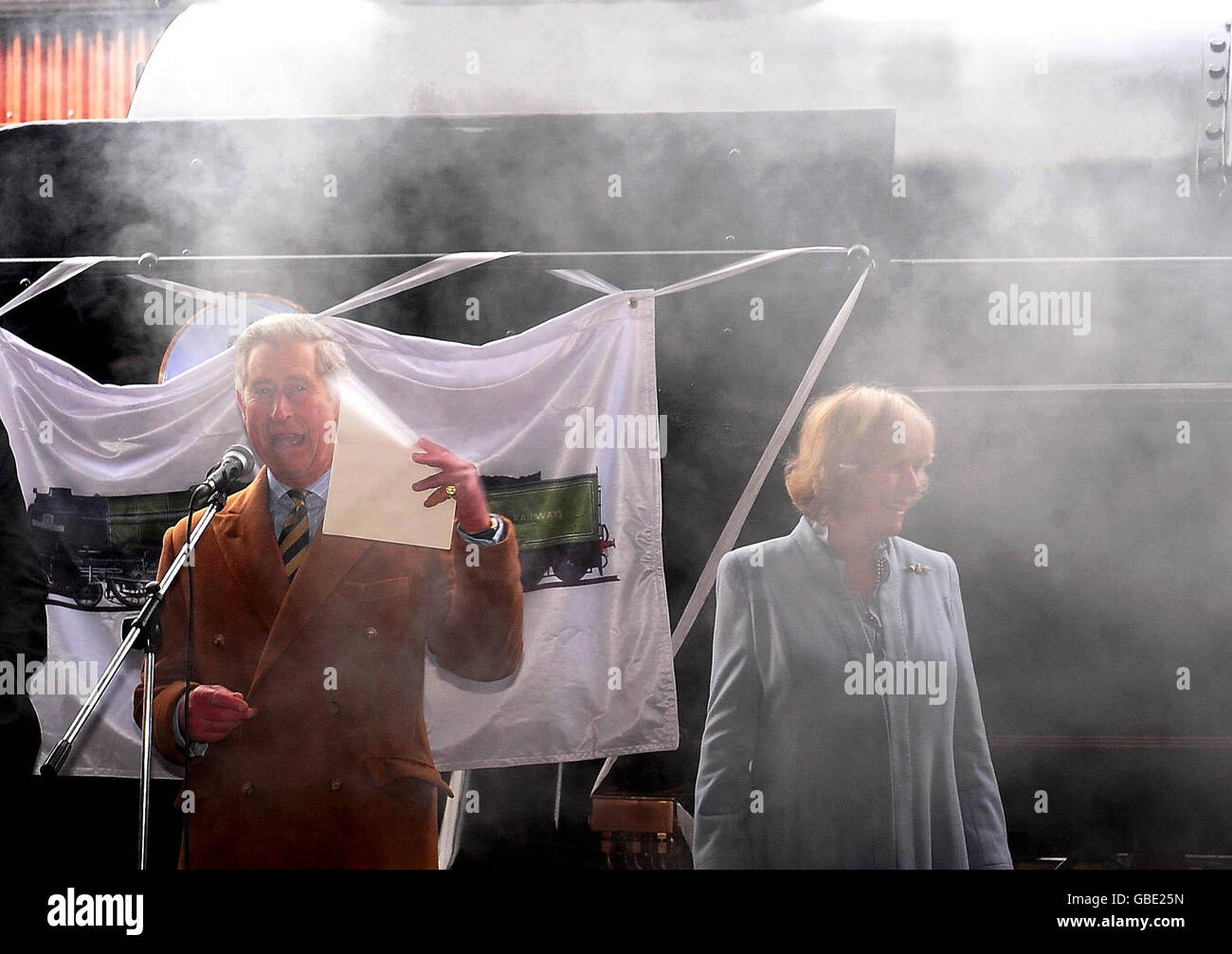 Half length mid top smiling mic mike microphone gesturing england hi ...