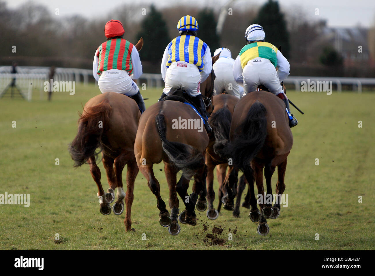 Horses and riders during The TurfTV.co.uk National Hunt Novices' Hurdle ...