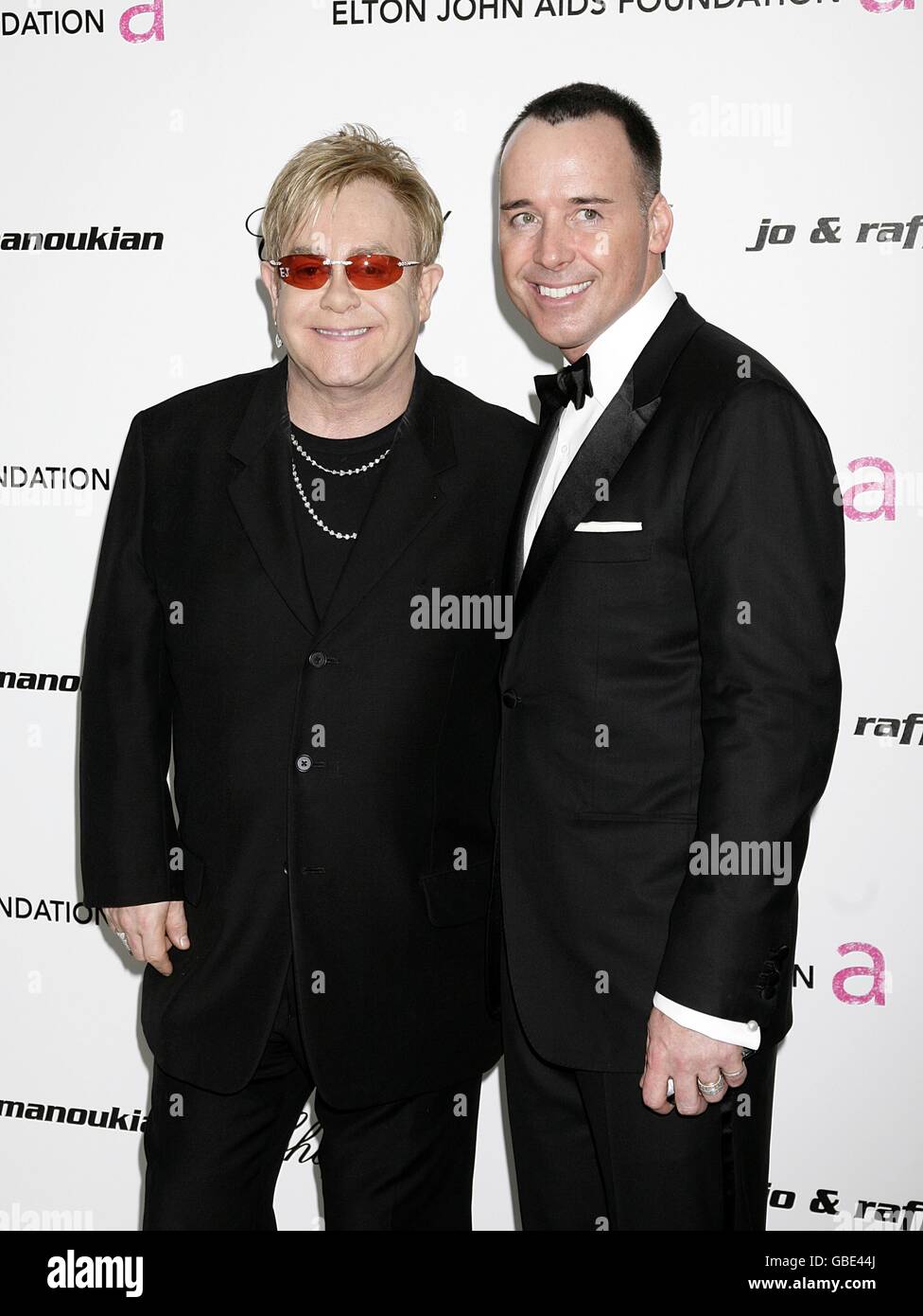 Sir Elton John and his partner David Furnish arriving for the 17th ...