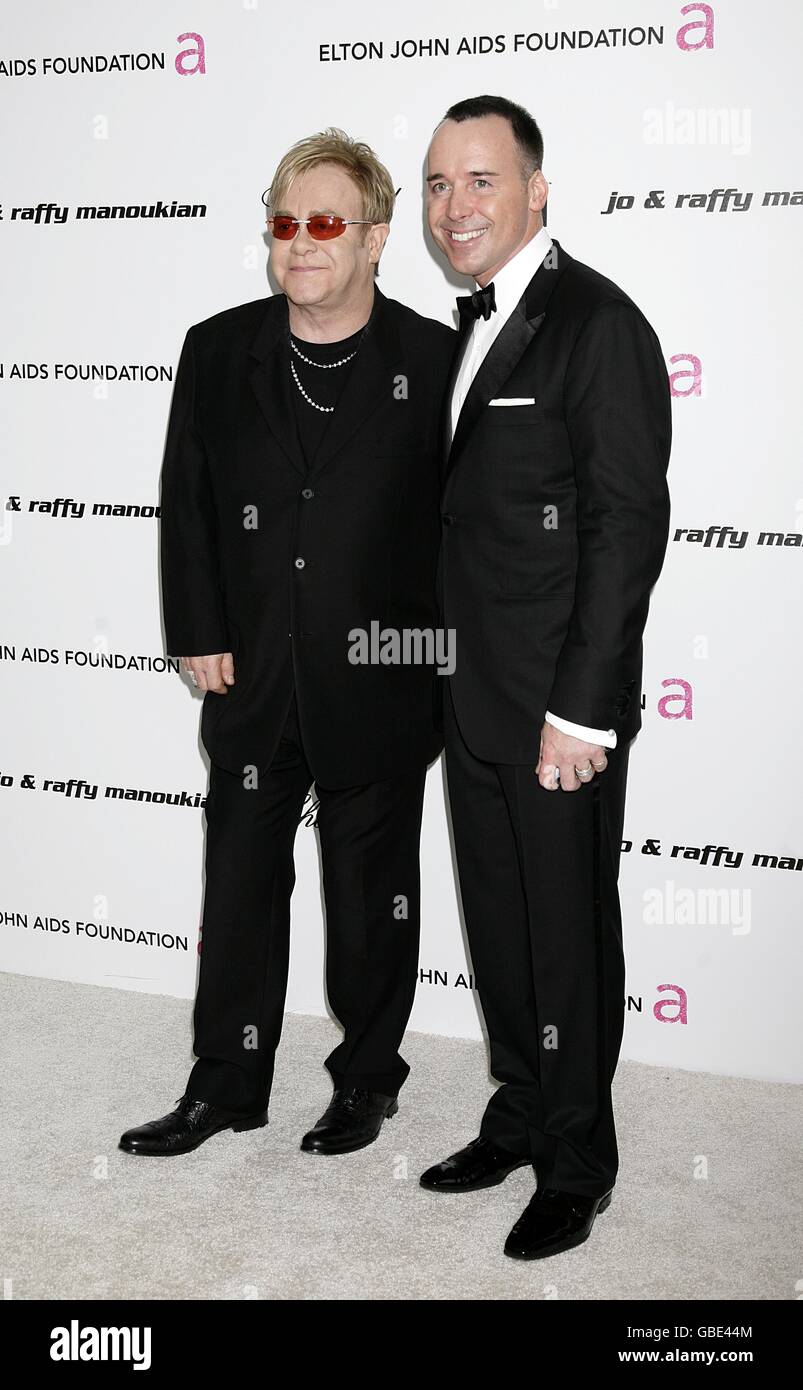 Sir Elton John and his partner David Furnish arriving for the 17th ...