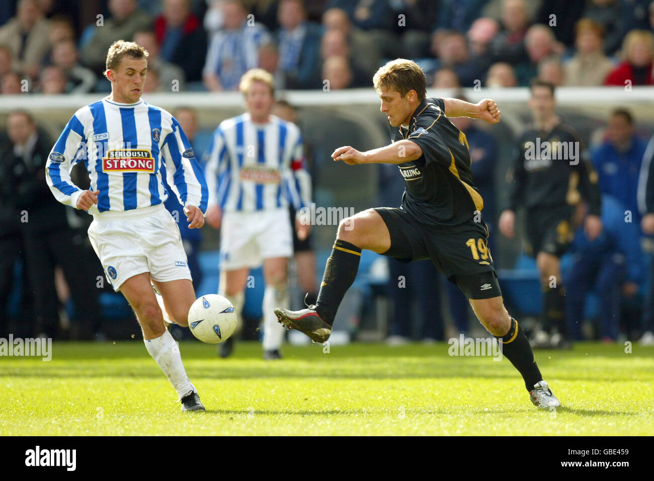 Celtic's Stiliyan Petrov and Kilmarnock's James Fowler Stock Photo - Alamy