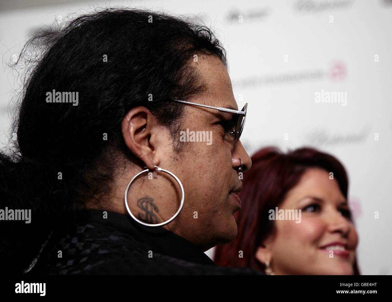 Slash and his wife Perla Hudson arriving for the 17th annual Elton John ...