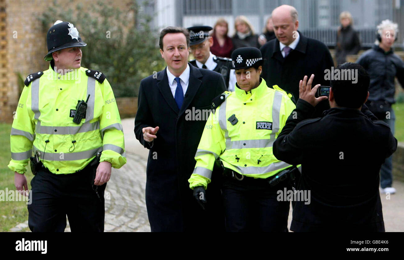 Cameron with police officers Stock Photo - Alamy