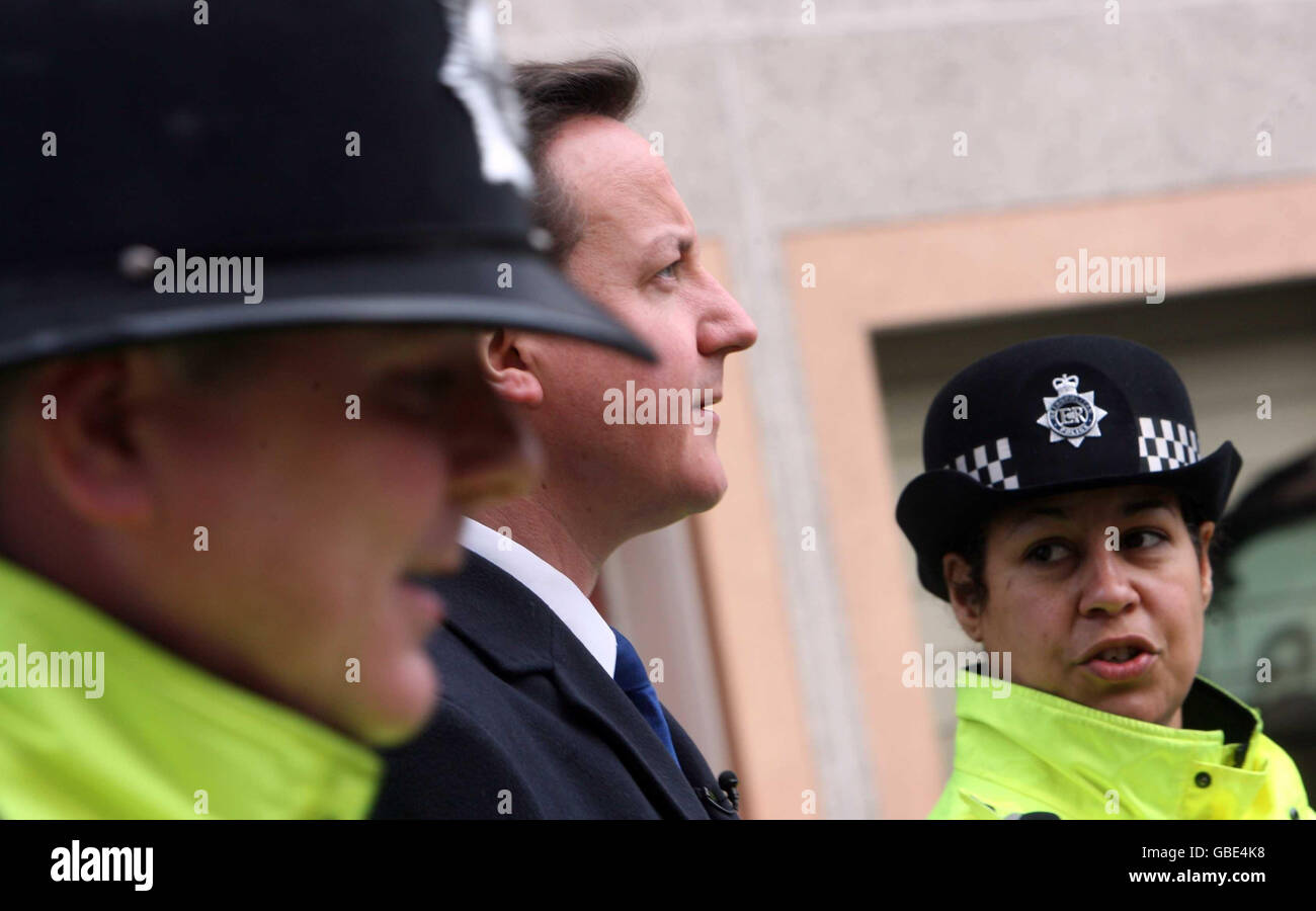 Cameron with police officers Stock Photo - Alamy