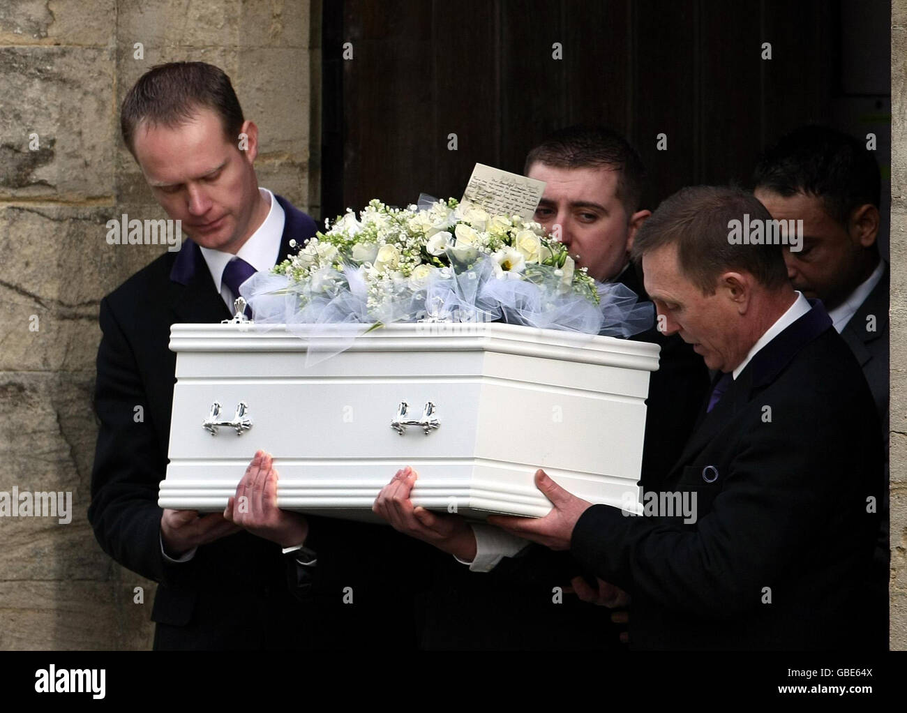 The coffin containing the body of 3-month-old Jaden Mack is carried ...