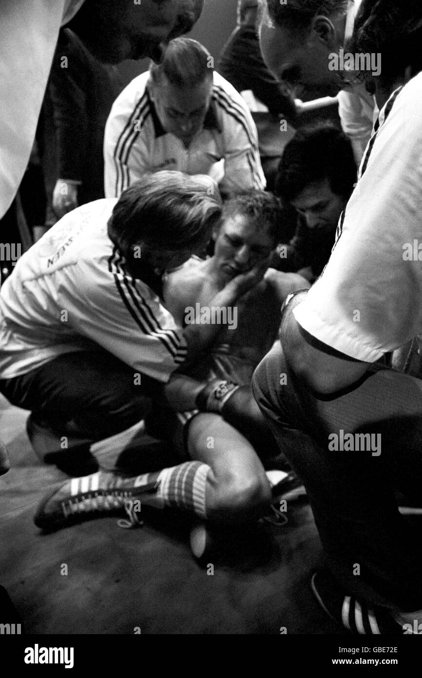 Anxious faces as his corner men work frantically to revive Dave "Boy ...