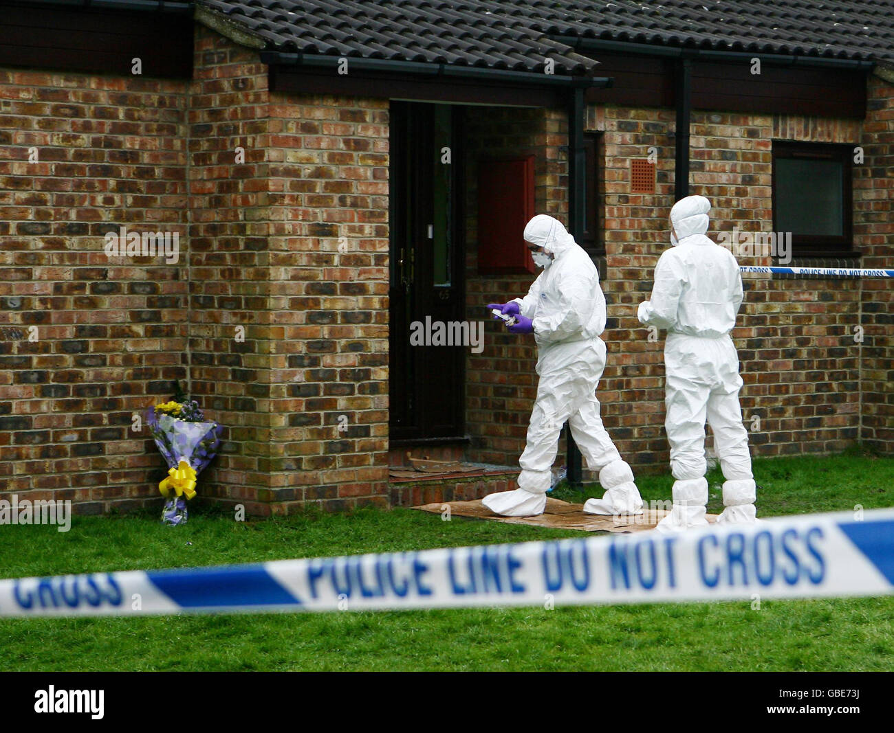Police officers outside the bungalow hi-res stock photography and ...