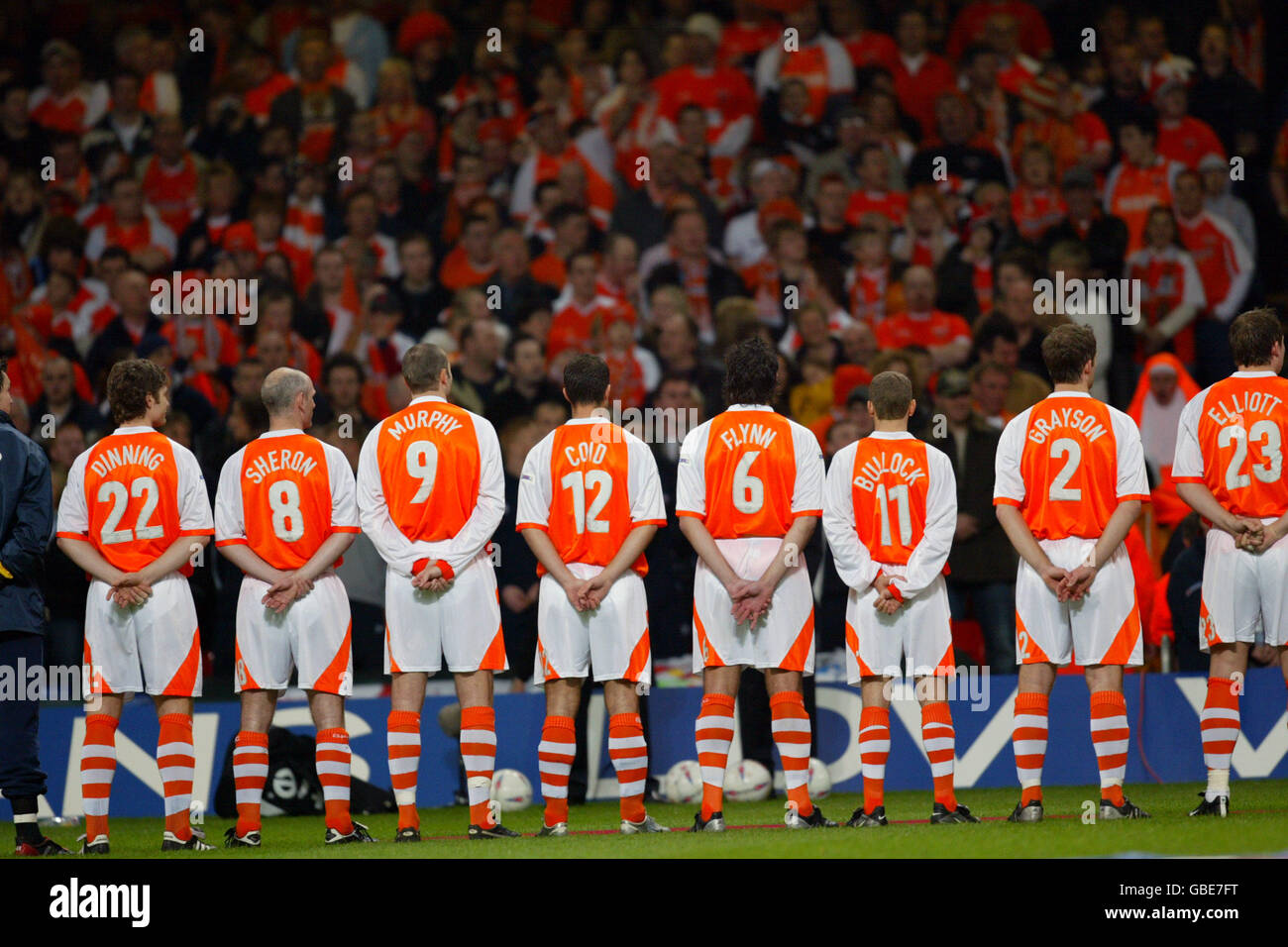 The Blackpool team observe the minutes silence before kick off Stock ...