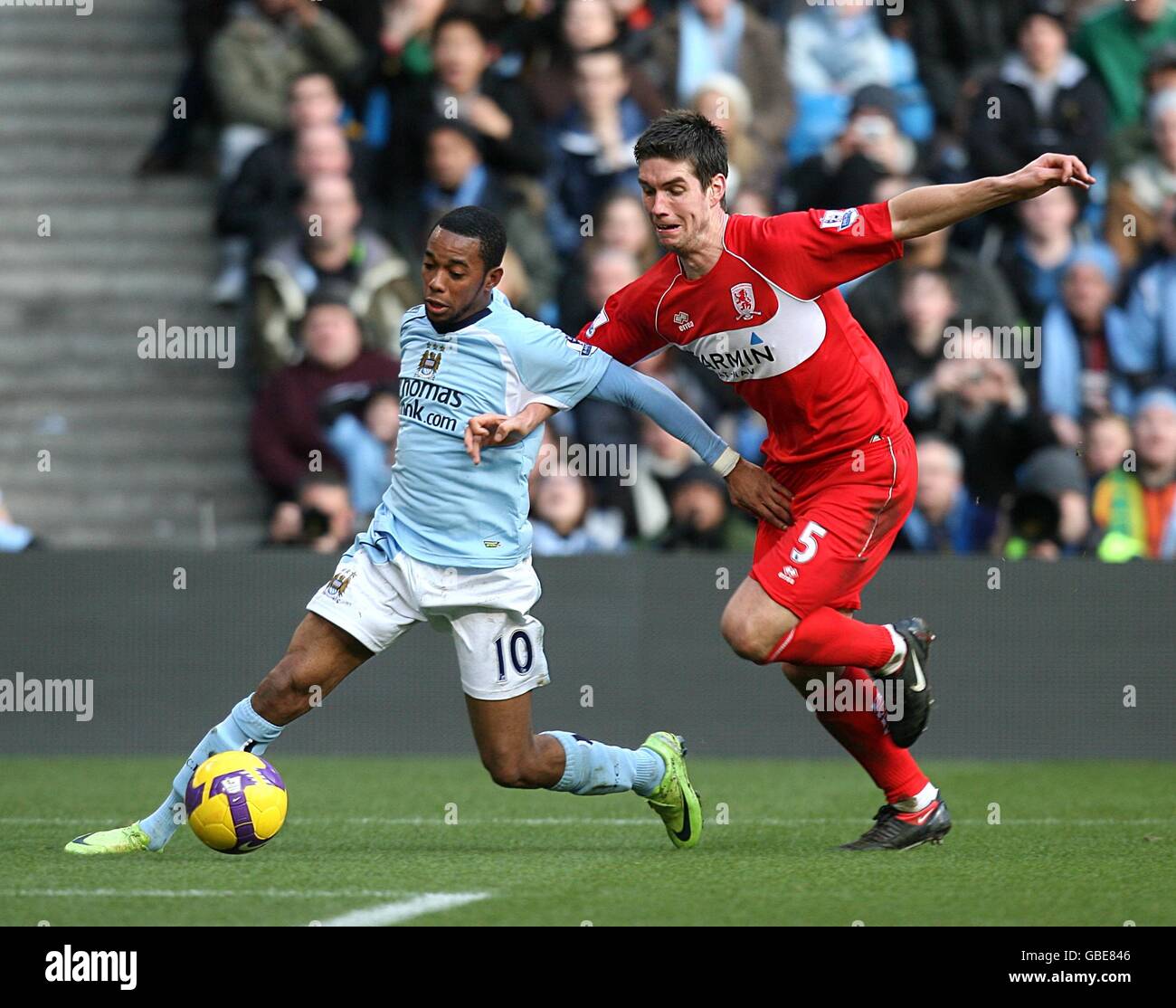 Middlesbrough's Chris Riggott and Manchester City's De Souza Robinho ...