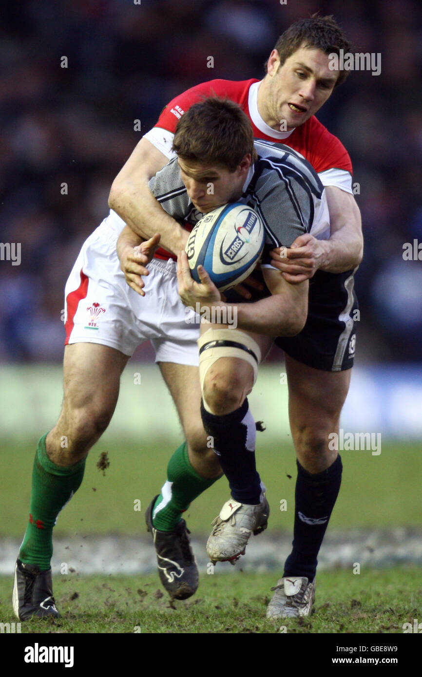 Scotlands phil godman front is challenged by wales andrew bishop hi-res stock photography and ...