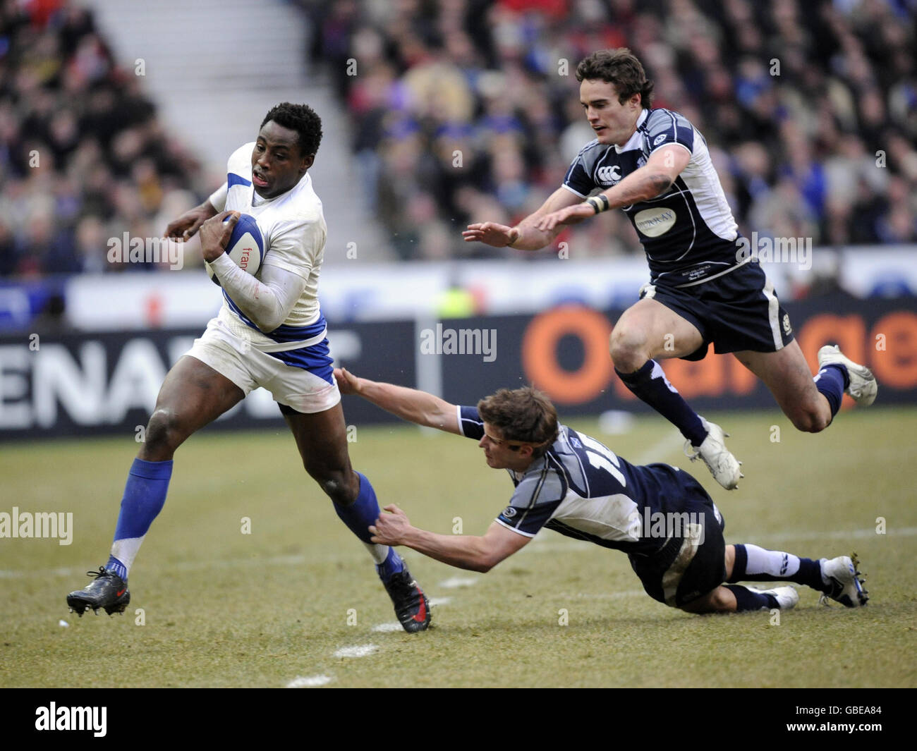 France's Fulgence Ouedraogo gets away from Scotland's Phil Godman ...
