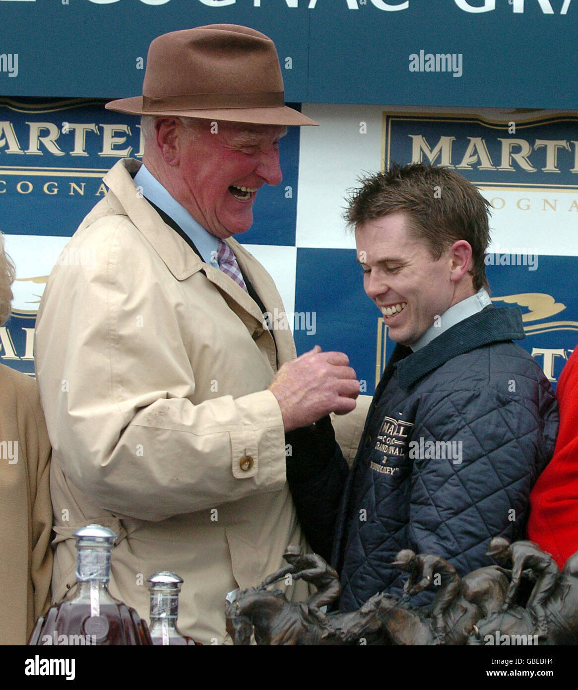 Trainer Ginger McCain congratulates jockey Graham Lee on his victory on ...