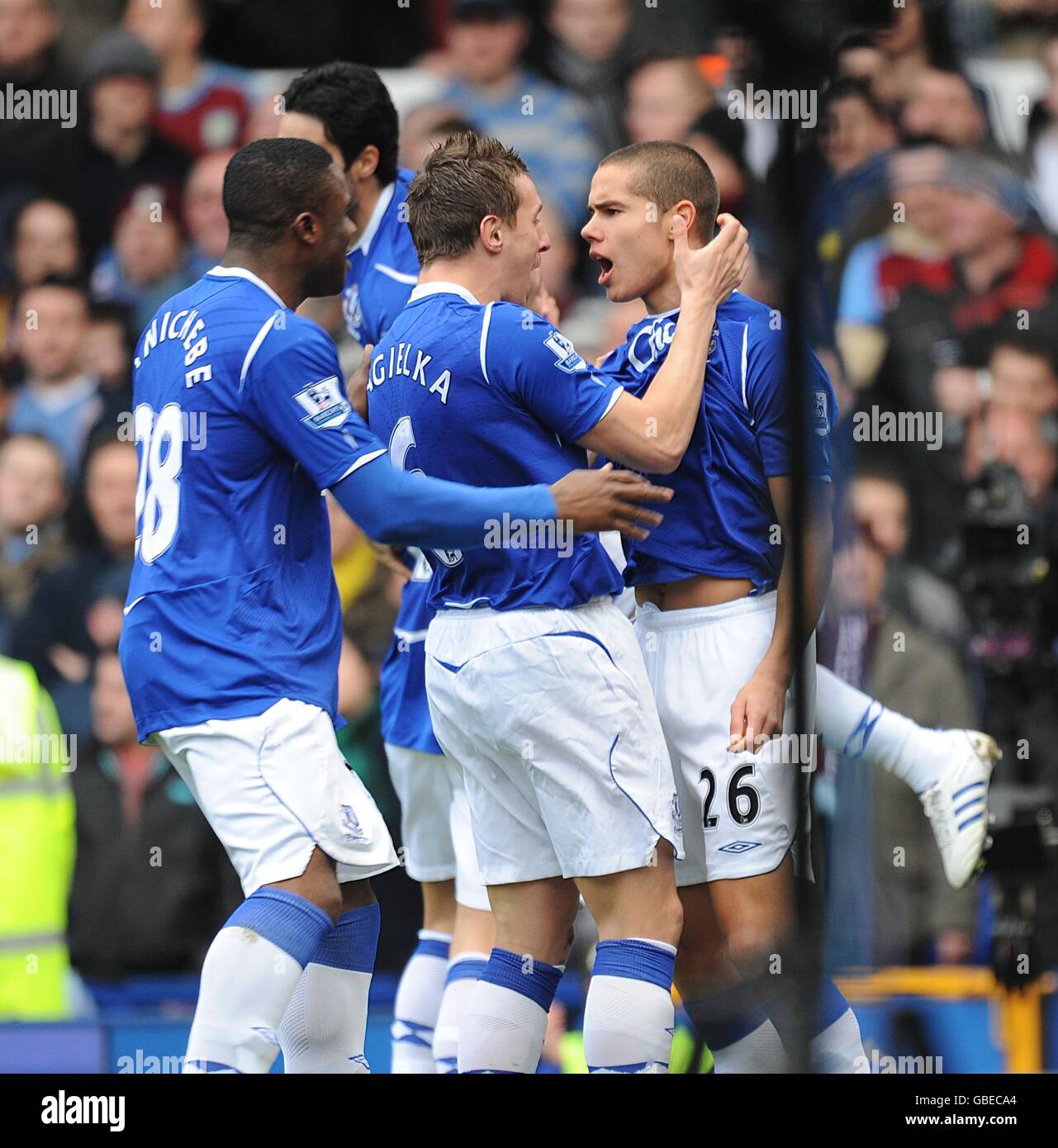 Everton's Jack Rodwell (r) celebrates with his team mates after he ...