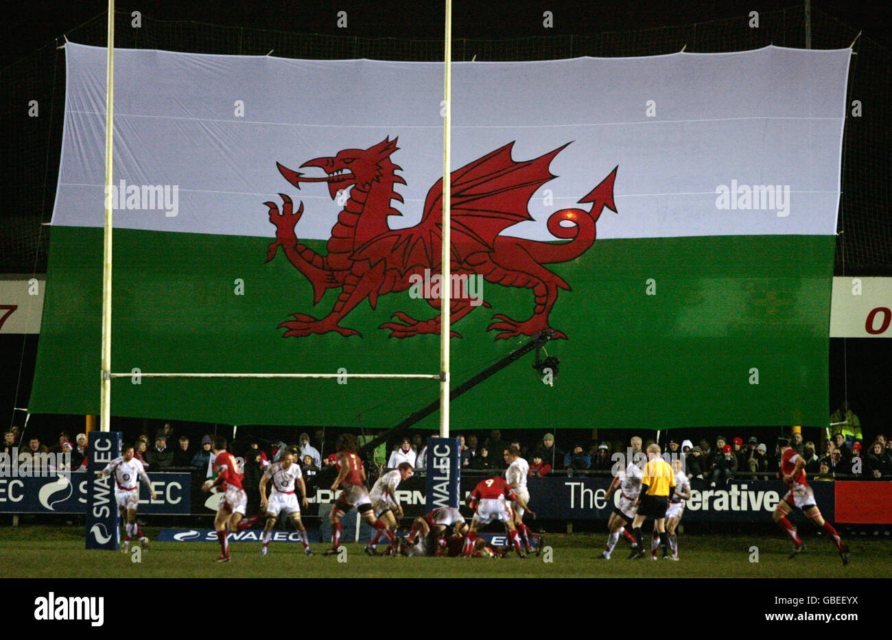 A Large Welsh flag hangs in the stands at The Brewery Field as Wales ...