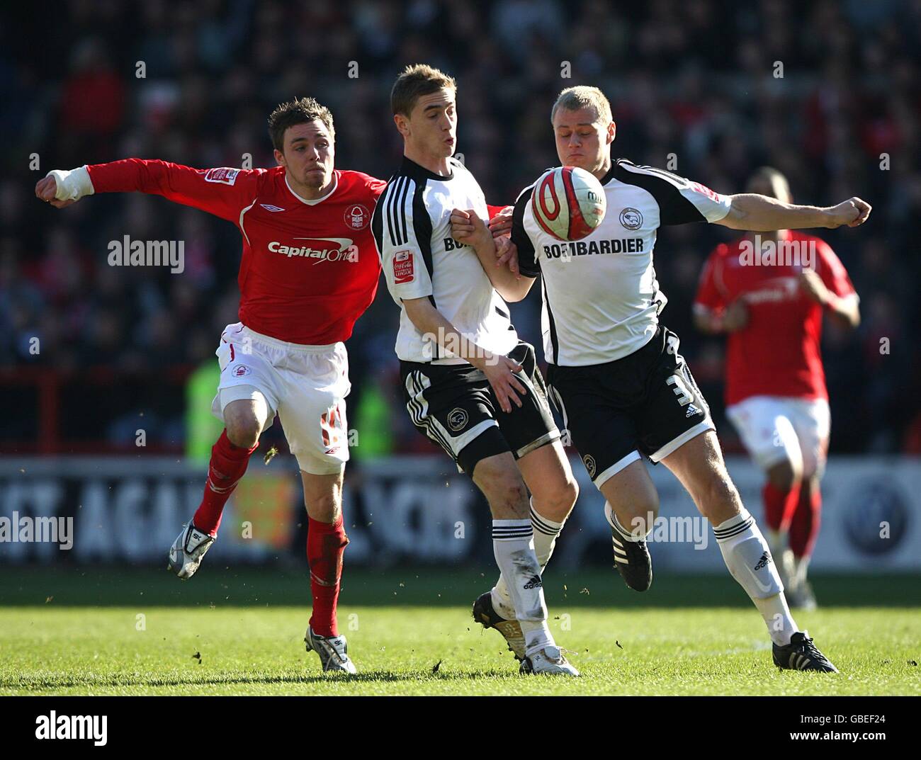 Nottingham Forest's Paul Anderson and Derby County's James McEveley ...