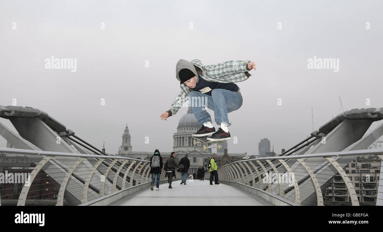 Pro skateboarder Pete King performs a jump on London's Millennium ...