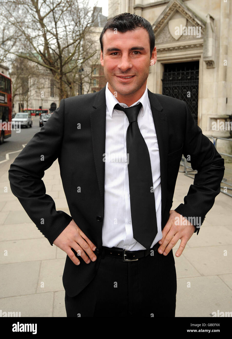 Undefeated world champion Joe Calzaghe arrives at the High Court in ...