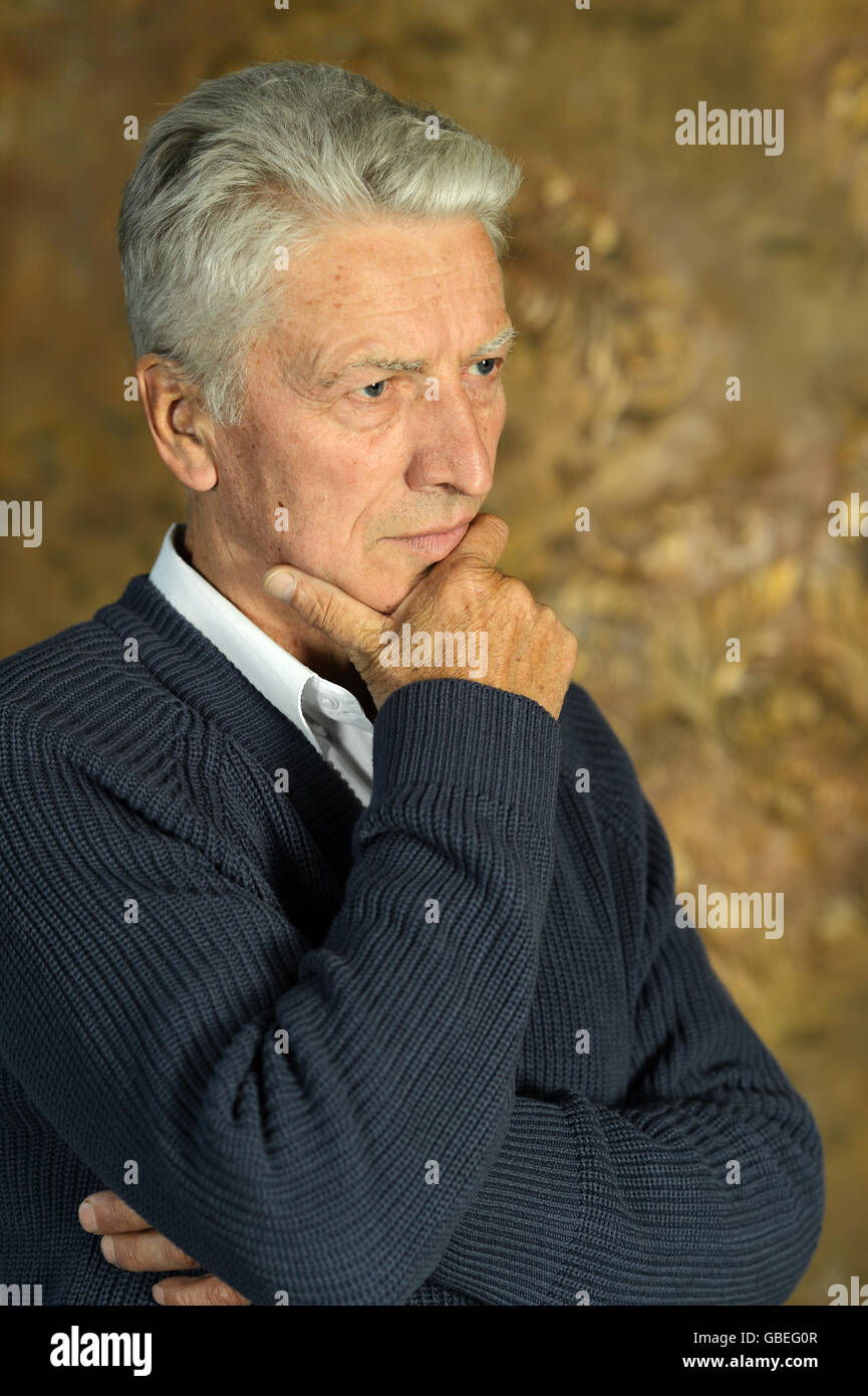 Thinking senior man Stock Photo - Alamy