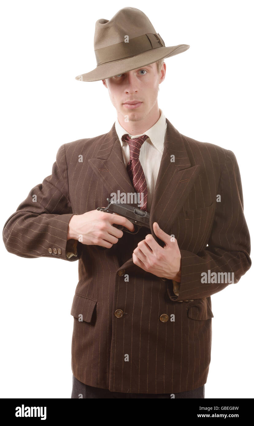 a gangster in a suit vintage, with handgun on white background Stock ...