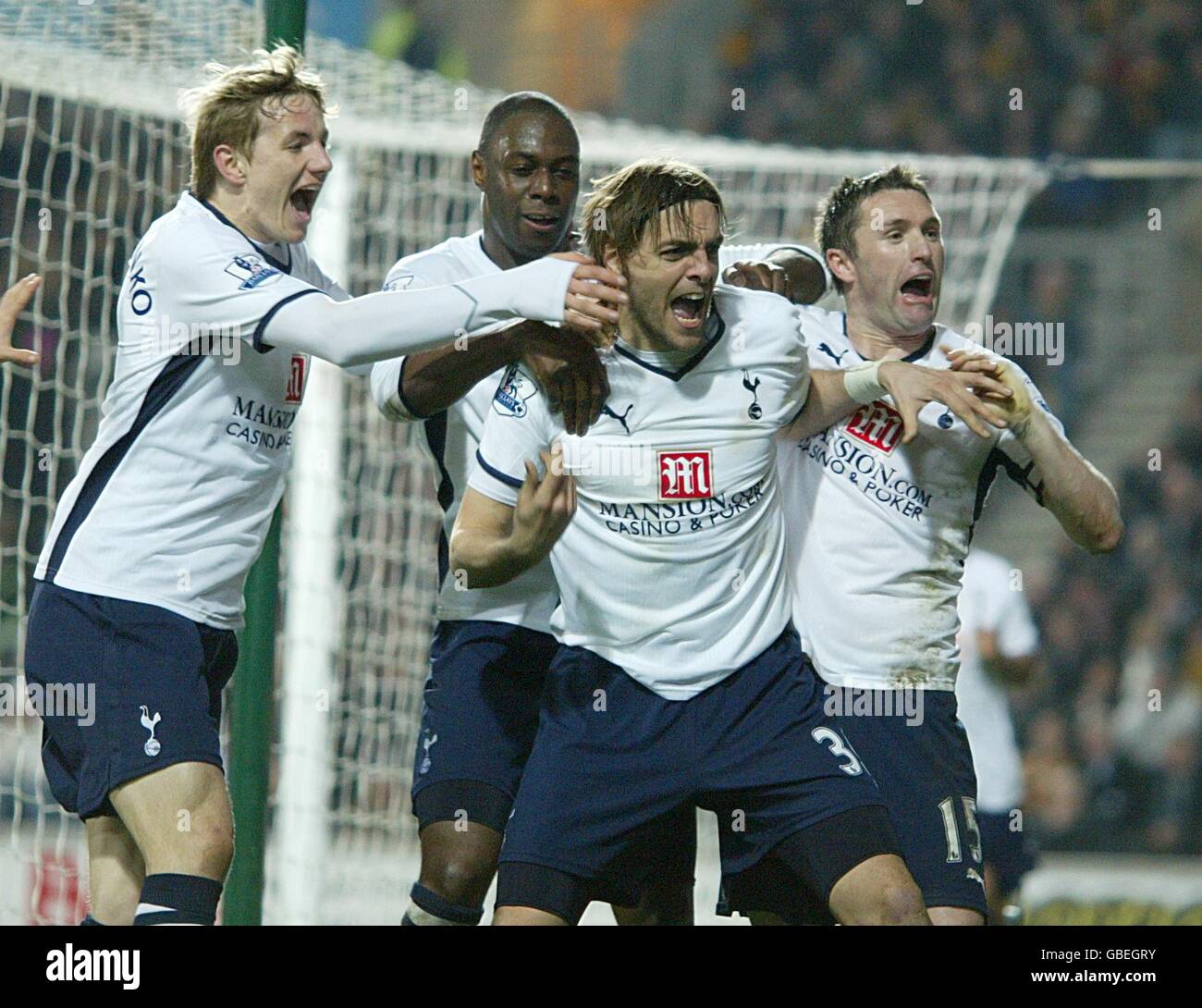 Tottenham Hotspur's Jonathan Woodgate (centre) celebrates scoring his ...