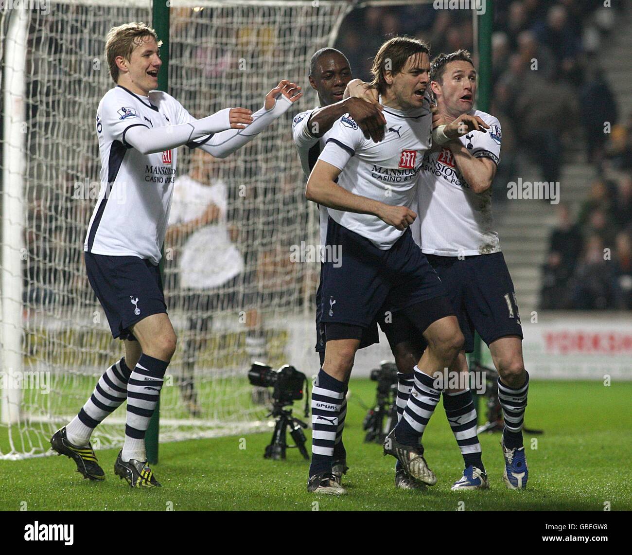 Tottenham Hotspur's Jonathan Woodgate (second from right) celebrates ...