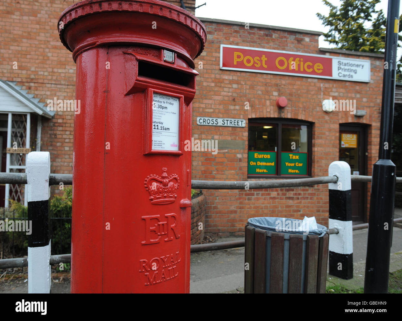 Red royal mail post box cross street hi-res stock photography and ...