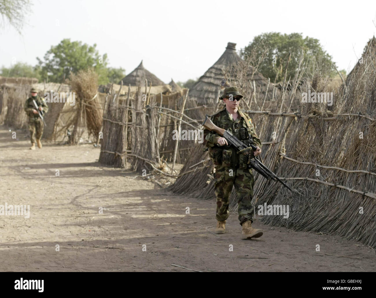 Members of the Irish Defence forces 99th Infantry battalion Patrol the ...