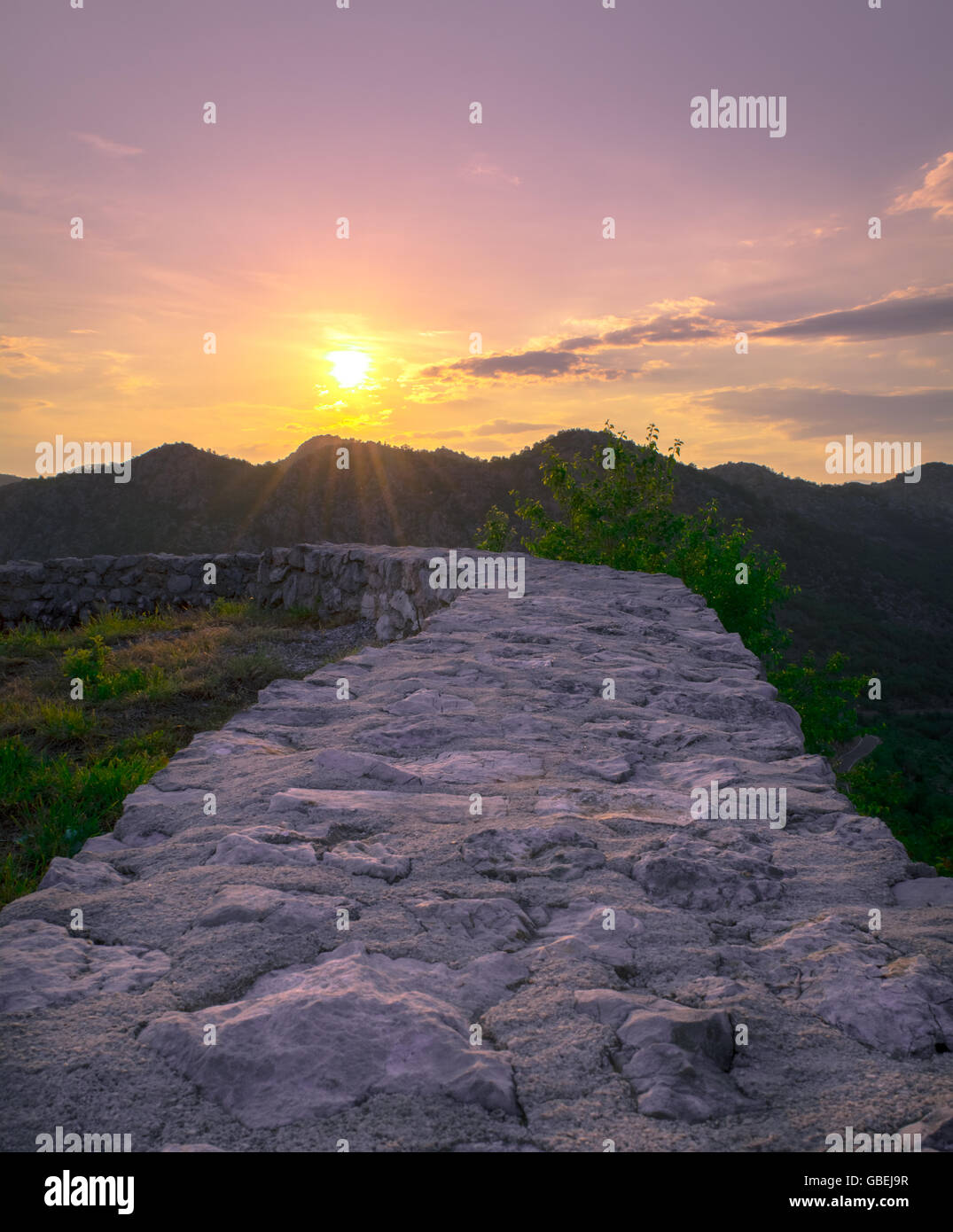 Wall to sunset Stock Photo - Alamy