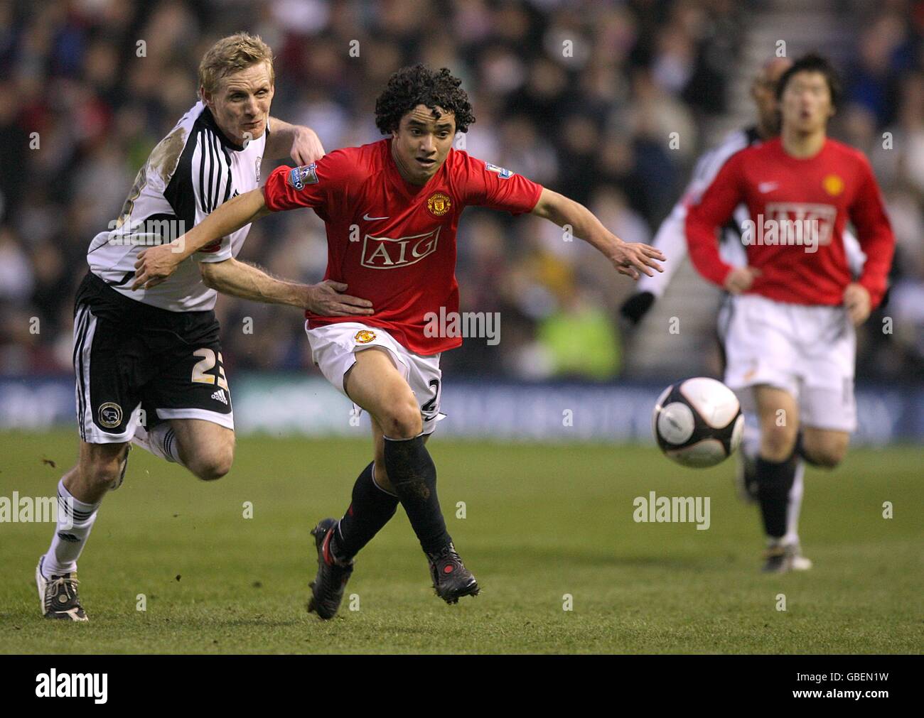 Derby County's Gary Teale (l) and Manchester United's Rafael Da Silva ...