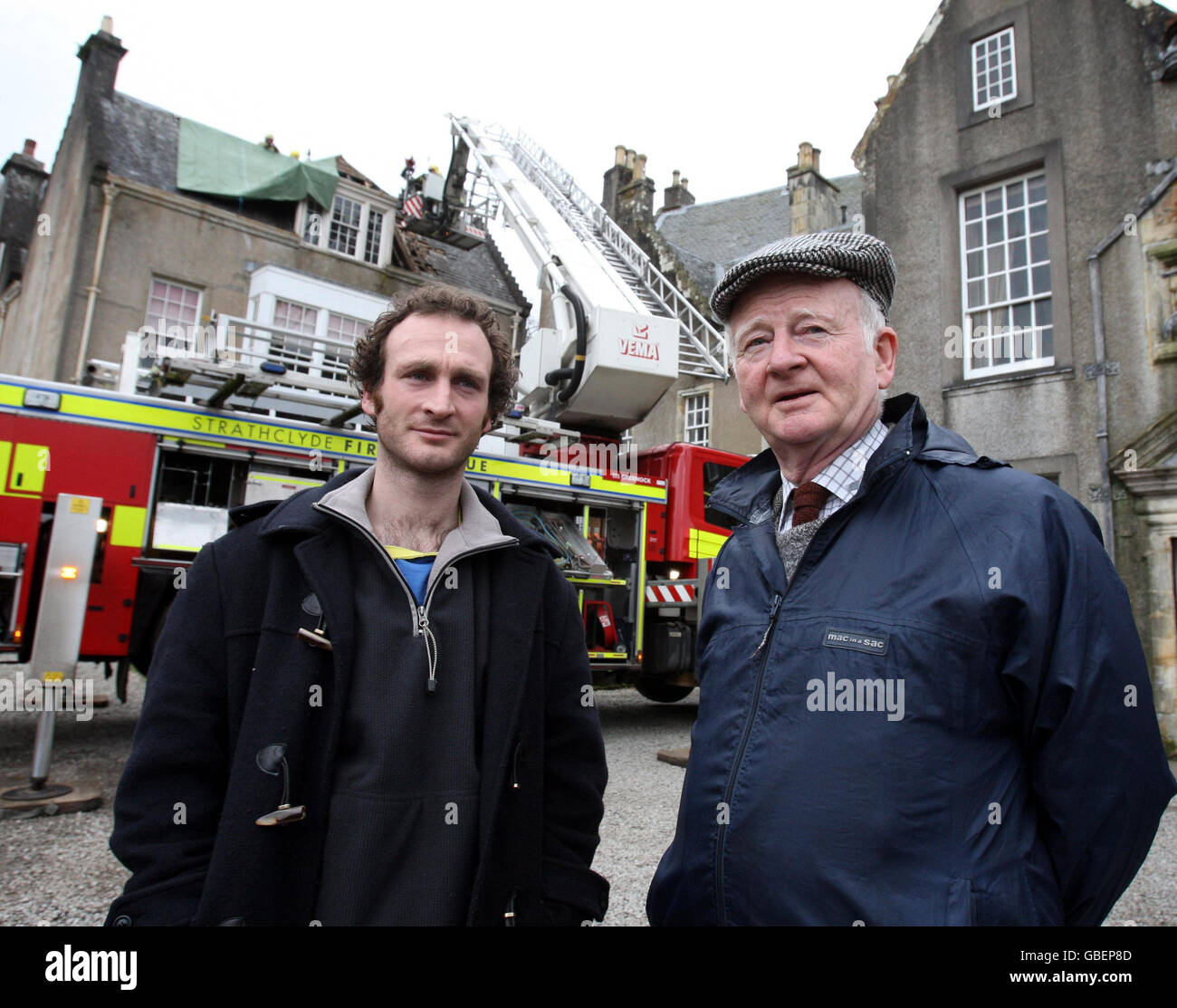 Lord Glasgow and his son David view the damage to Kelburn Castle after ...