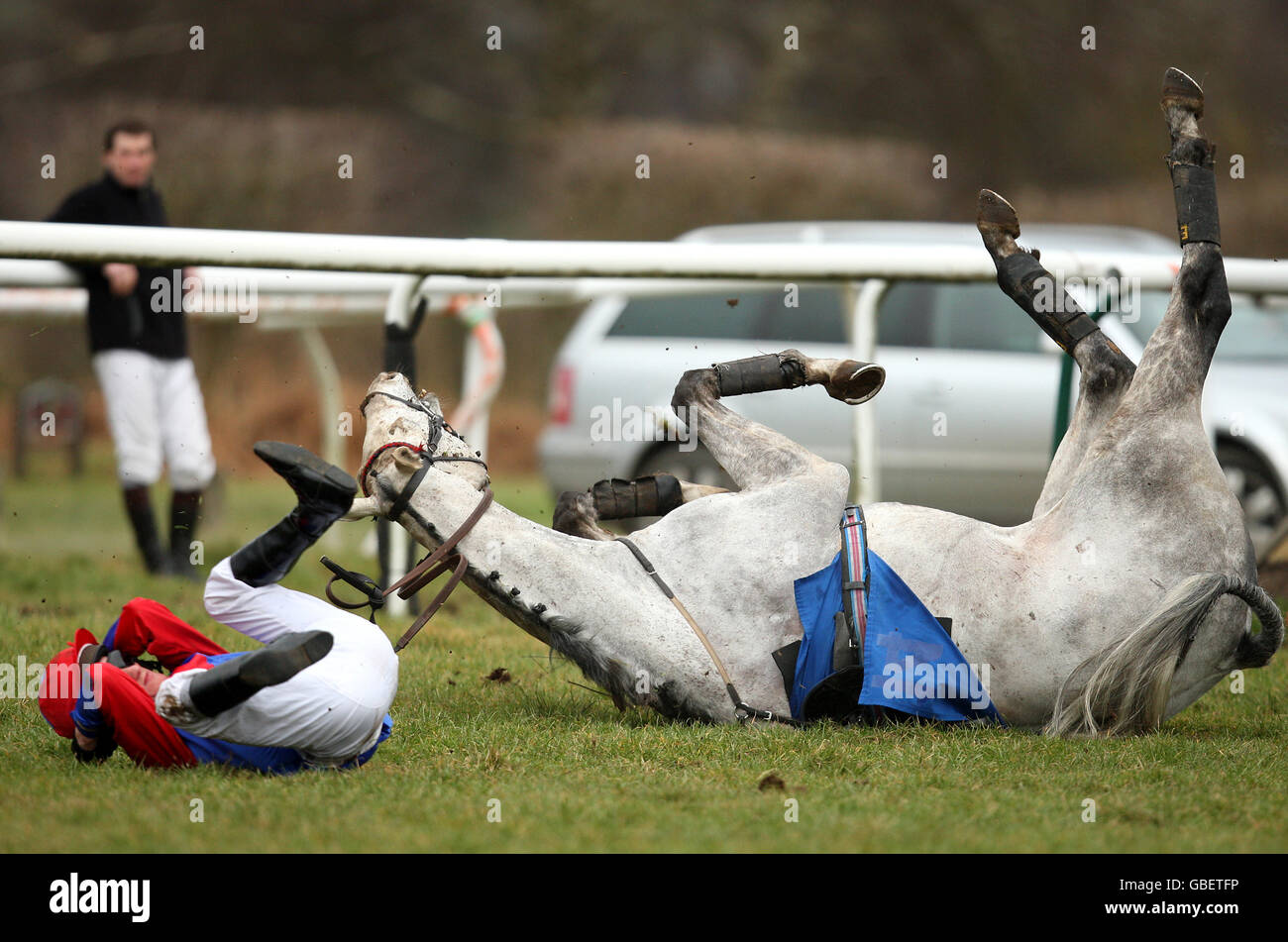 Themanfrommayo and jockey Matt Crawley fall during the Teme Conditional ...