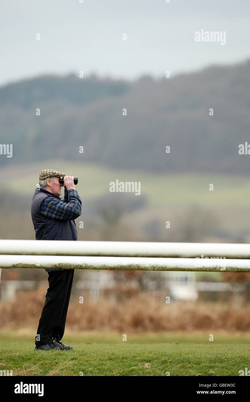 Spectator watches the racing at ludlow racecourse hi-res stock ...