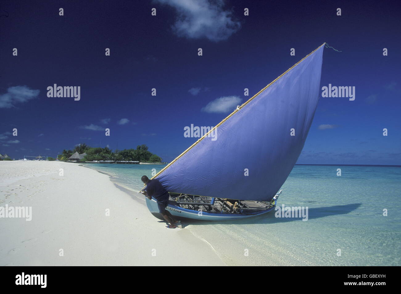 a dhoni Boat on the coast of the island and atoll of the Maldives ...